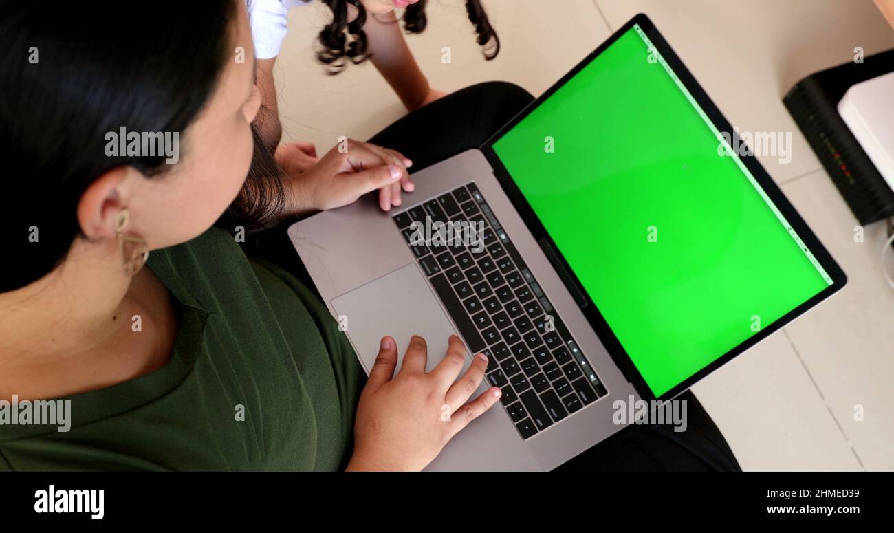 Person using computer laptop, blank green screen mock-up Stock Photo ...