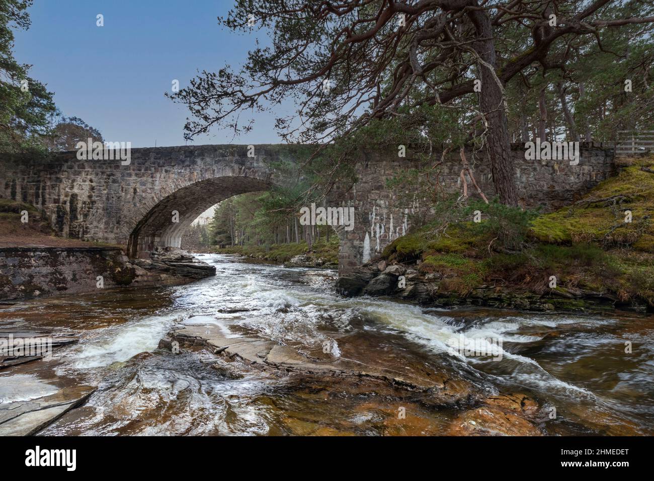 RIVER LUI MAR LODGE ESTATE BRAEMAR SCOTLAND COLOURED ROCKS AND WHITE ...
