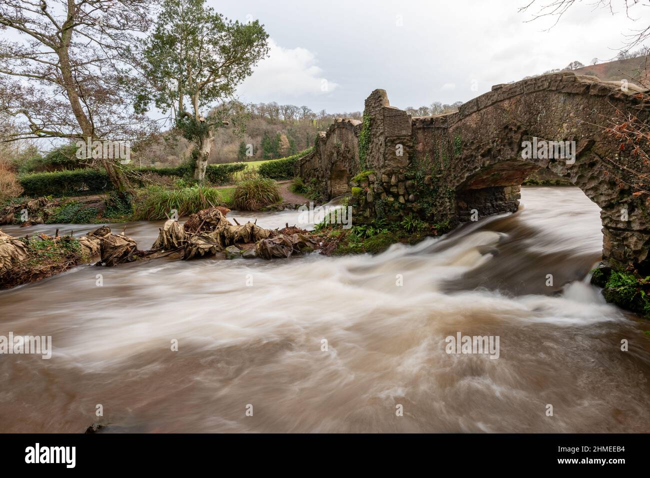 Long exposure of the river Avill flowing under Lovers bridge in the ...