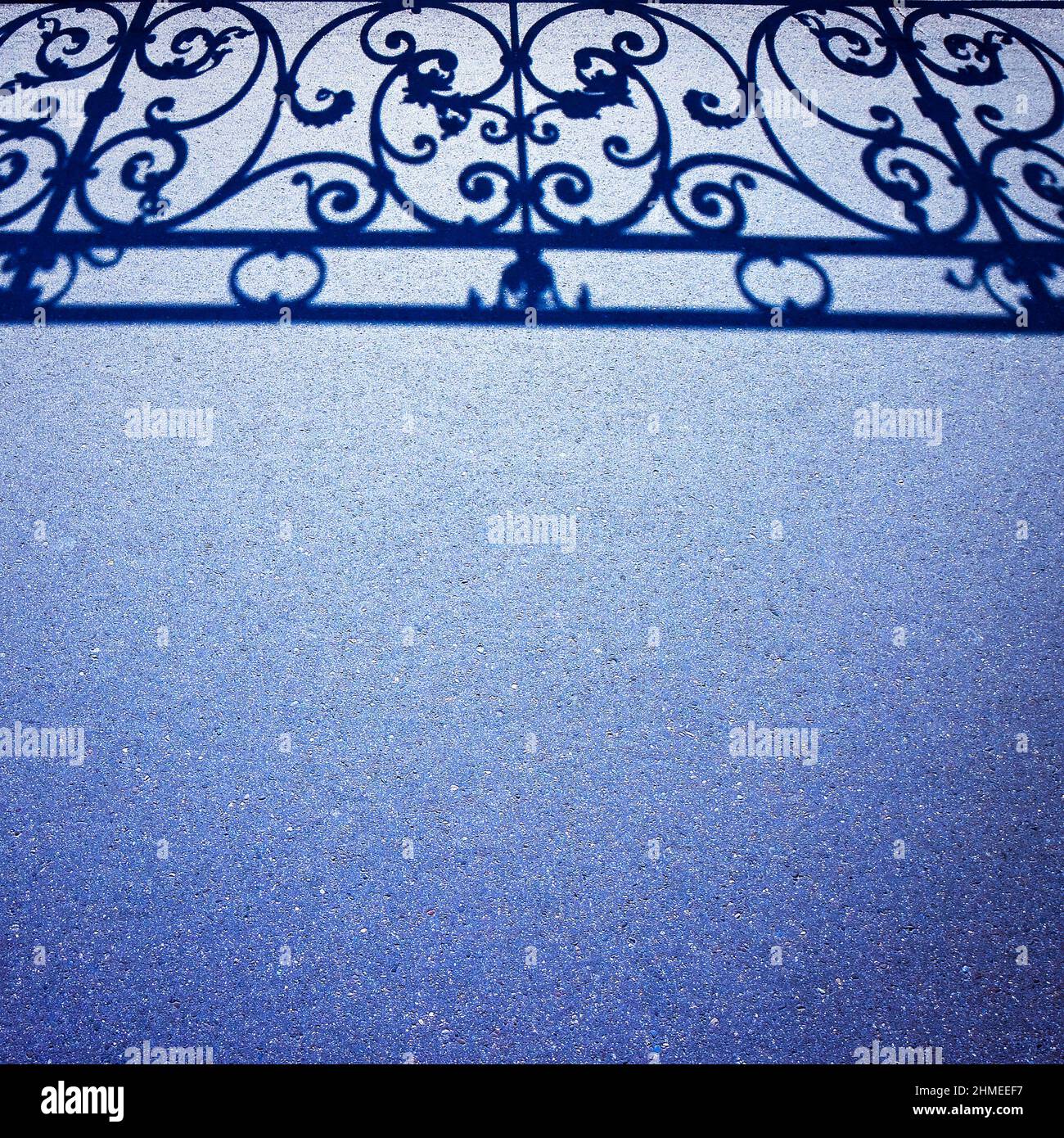 Shadow of an old wrought iron railing on a walkway in Lucerne ...