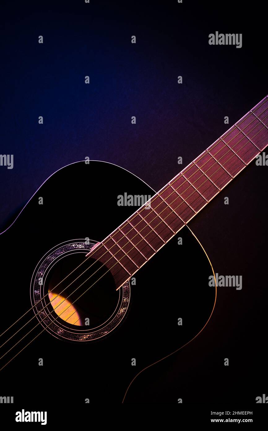 black guitar front view vertical. guitar music low-key concept Stock ...