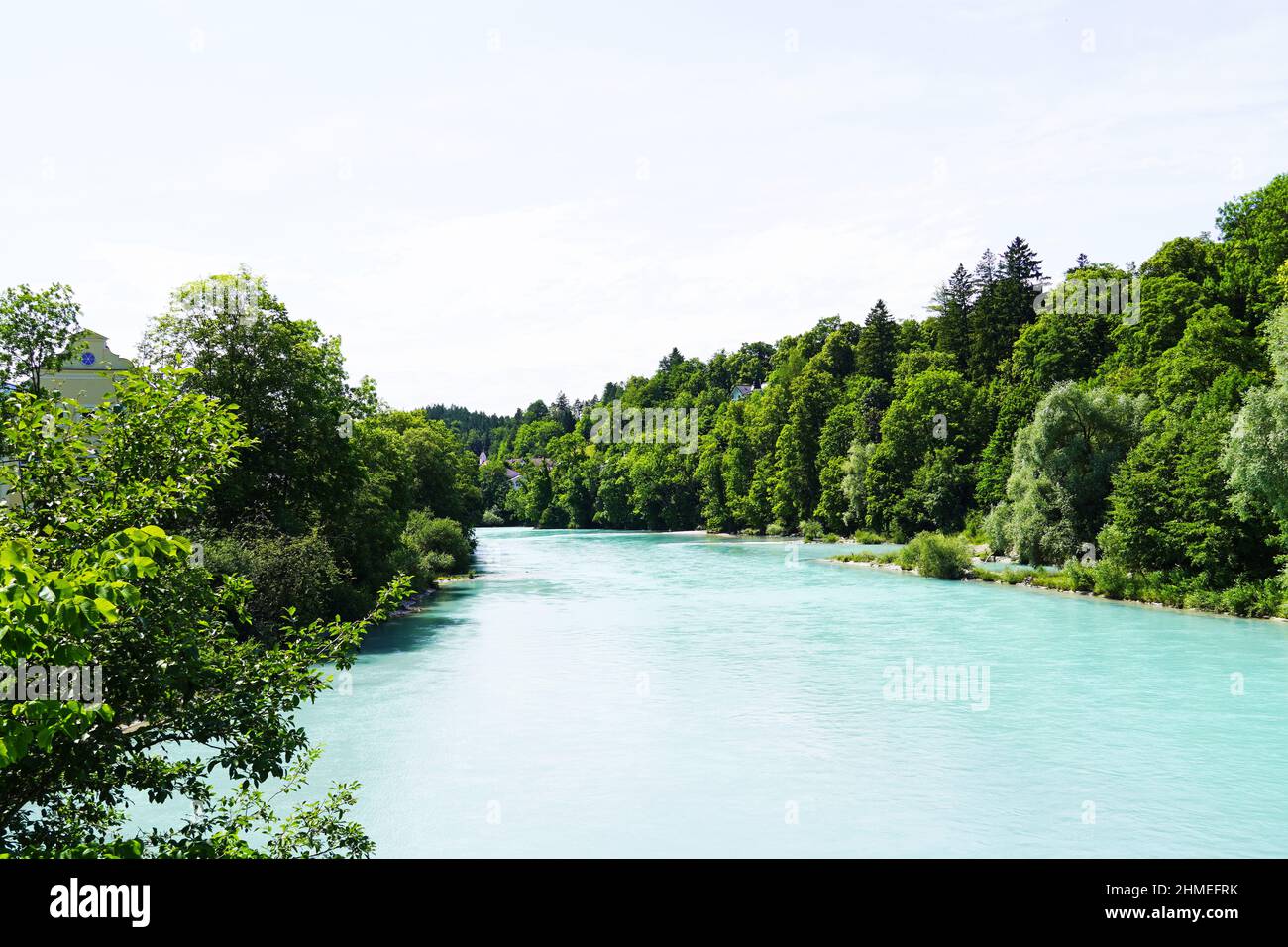 Turquoise clear river surrounded by greenery in Fussen, Bavaria ...