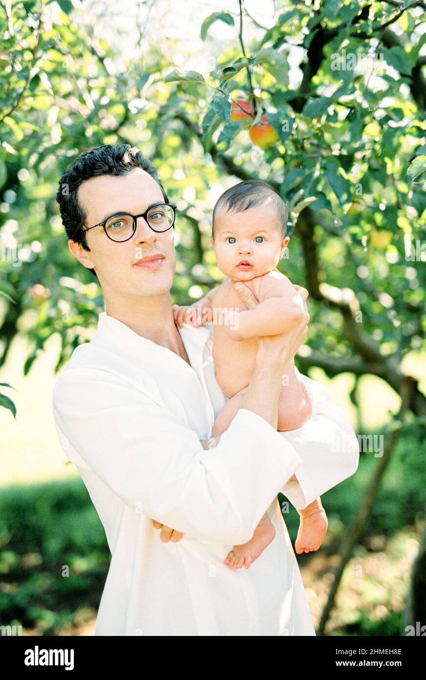 Man under apple tree hi-res stock photography and images - Alamy