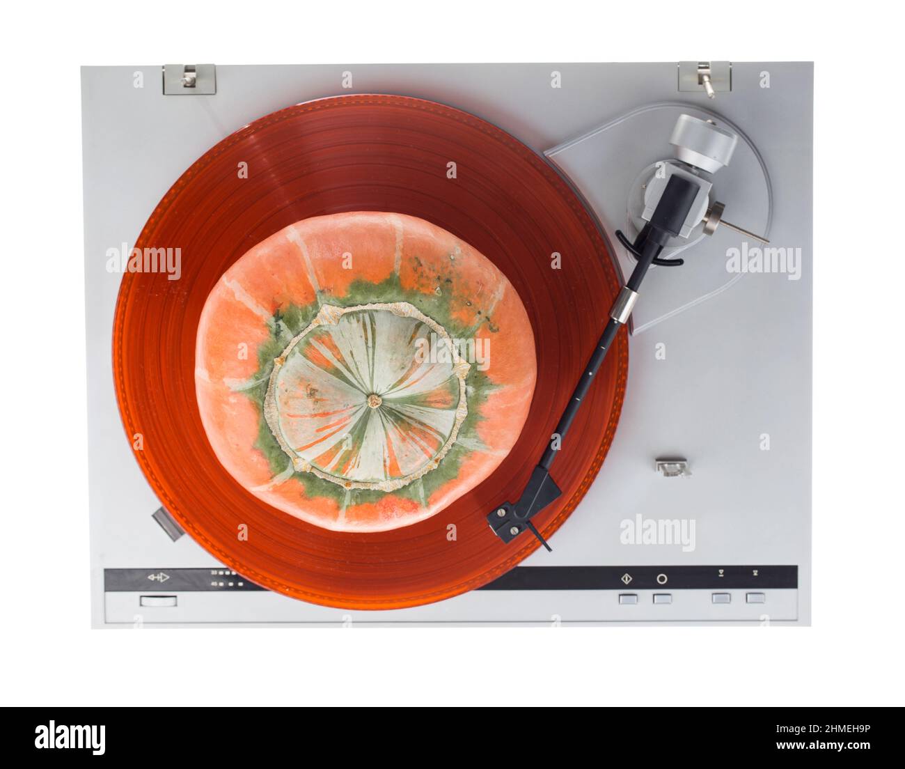 Analog music player with pumpkin on a white background Stock Photo - Alamy