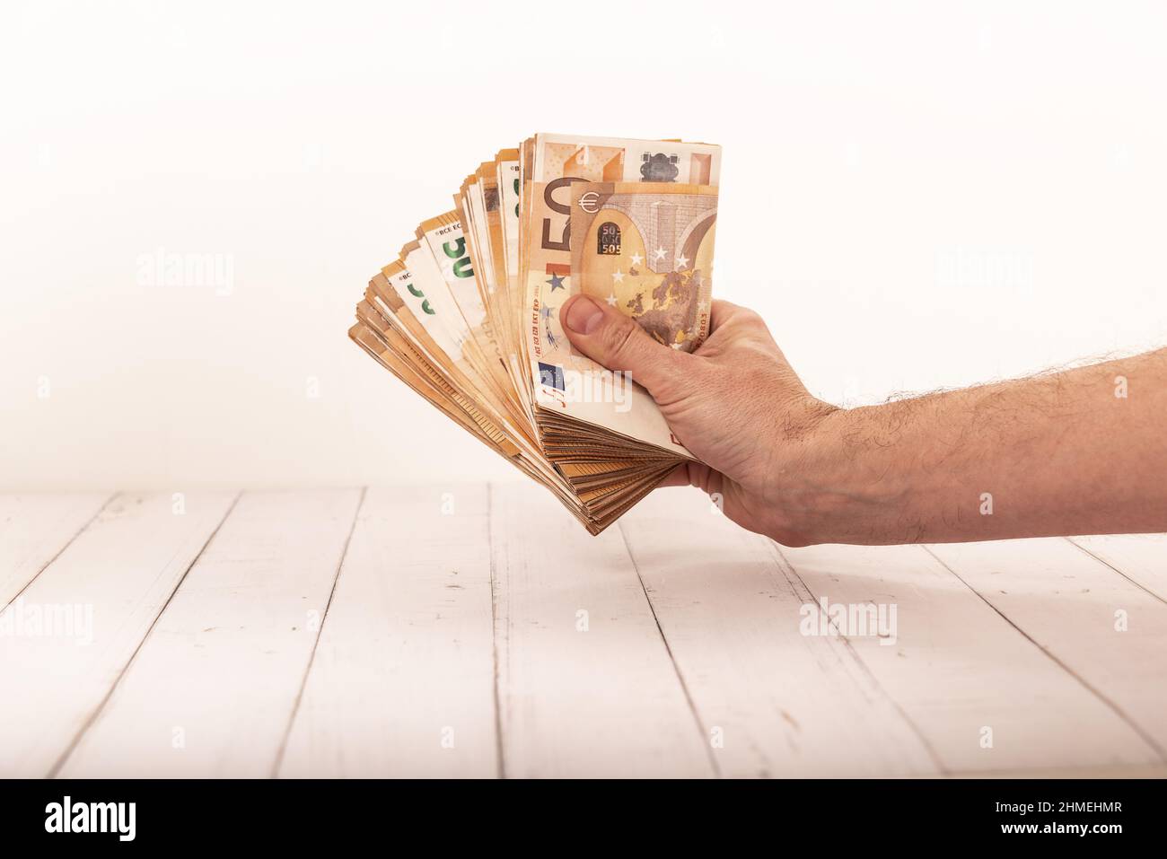 human hand with money isolate on white Stock Photo - Alamy