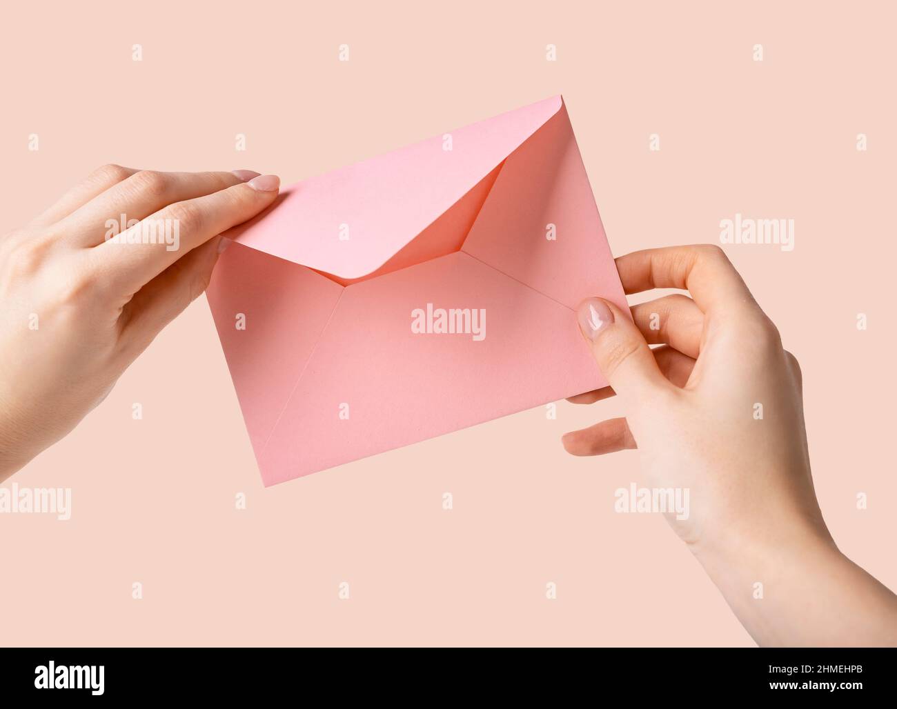Woman hands holding envelope hi-res stock photography and images - Alamy