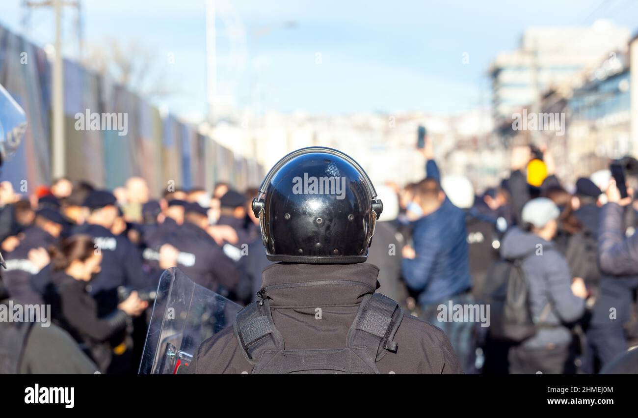 Riot police officer on duty during crowd protest or demonstration Stock ...