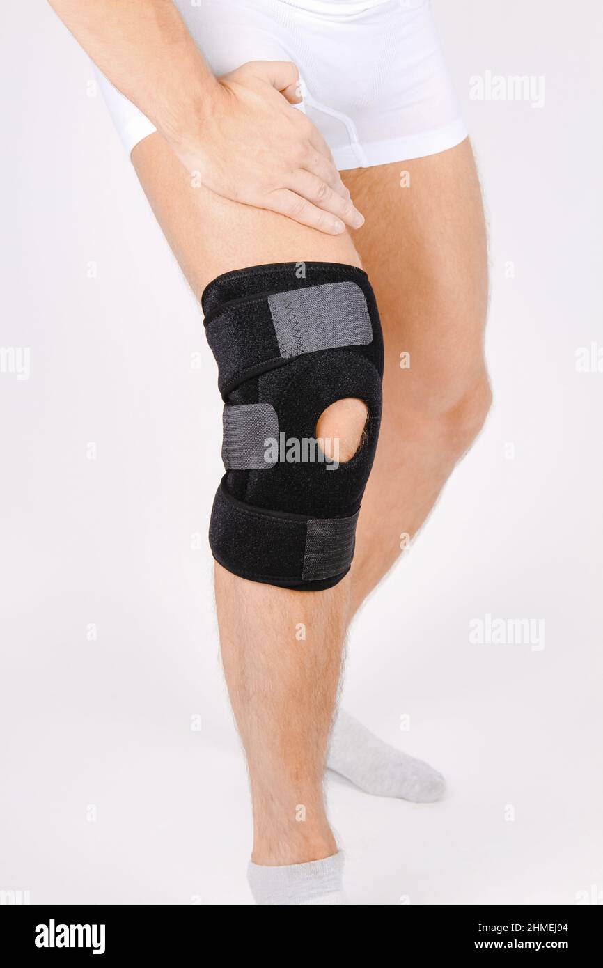 Knee Support Brace on leg isolated on white background. Elastic ...
