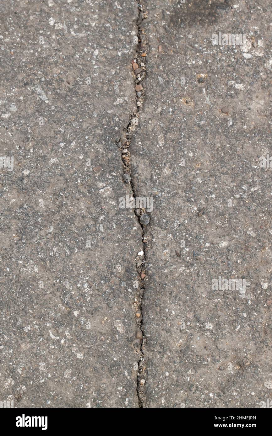 Closeup cracked asphalt pavement located as a whole background Stock ...