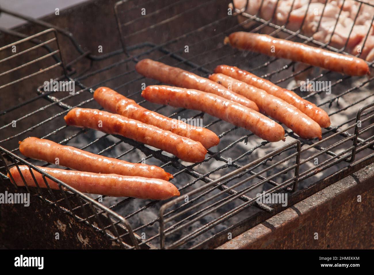 Grilled sausages on flaming grill hi-res stock photography and images ...
