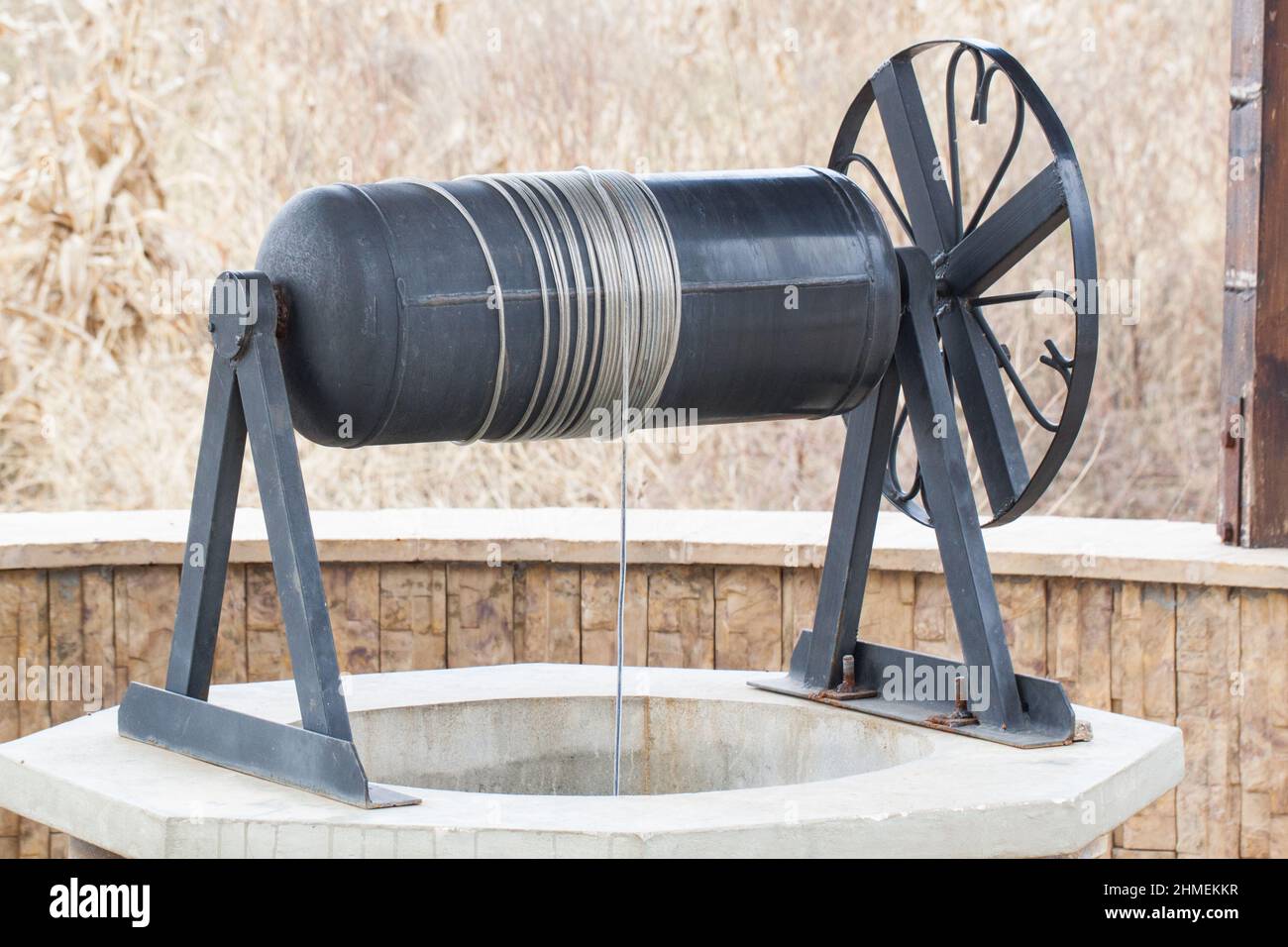 New draw-well with bucket of water inside Stock Photo - Alamy