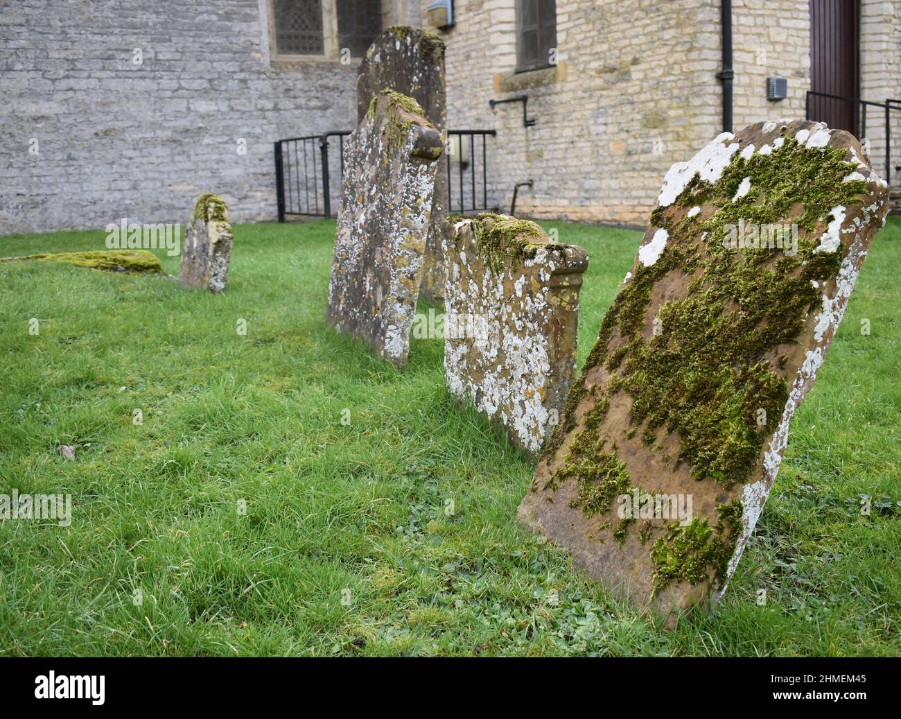 Old gravestones in churchyard hi-res stock photography and images - Alamy