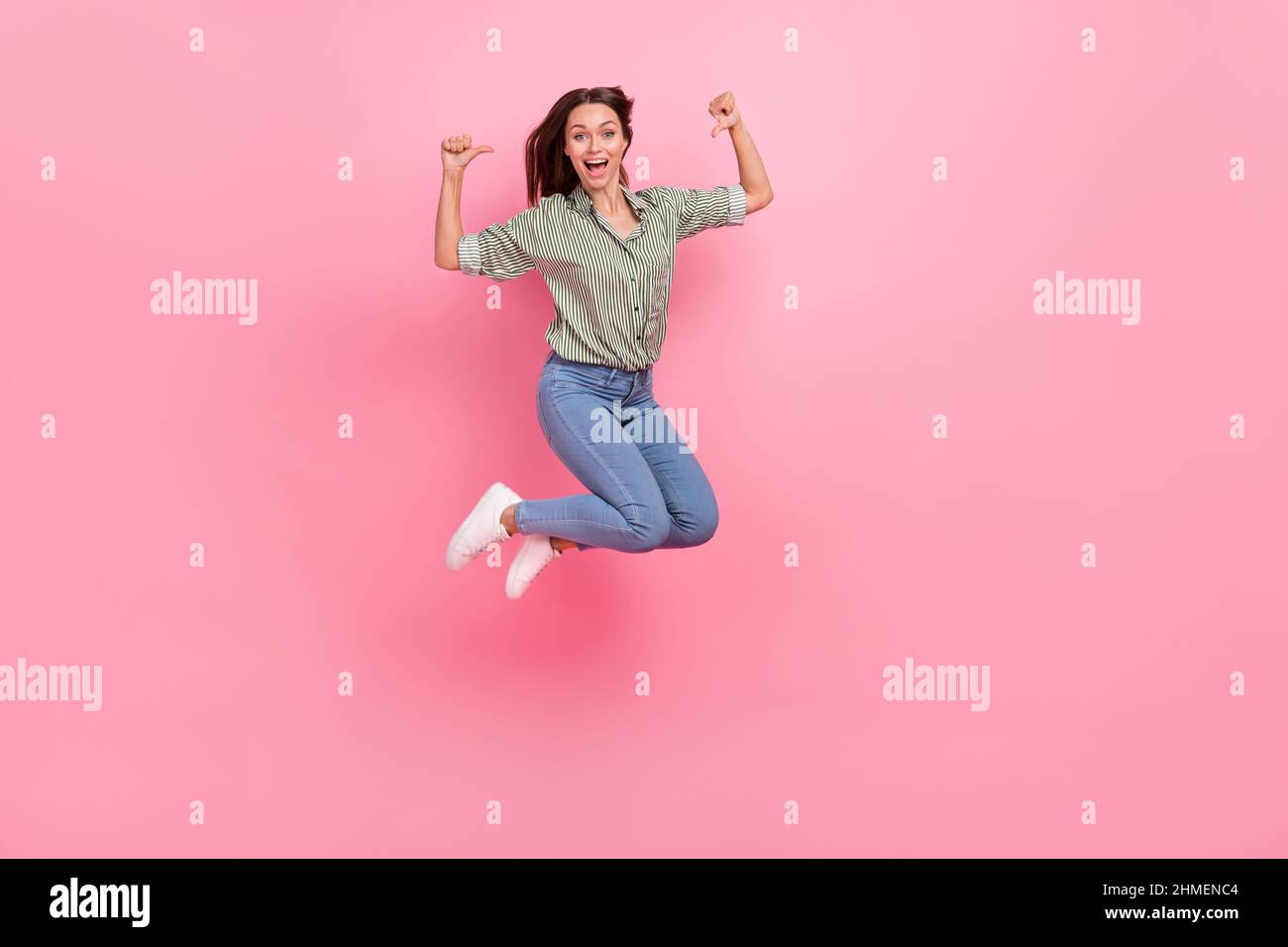 Full size photo of cool young brunette lady jump wear outfit jeans ...