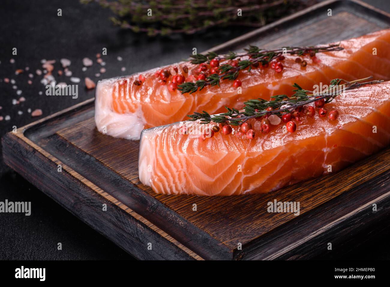 Salmon. Fresh raw salmon fish fillet with cooking ingredients and herbs ...