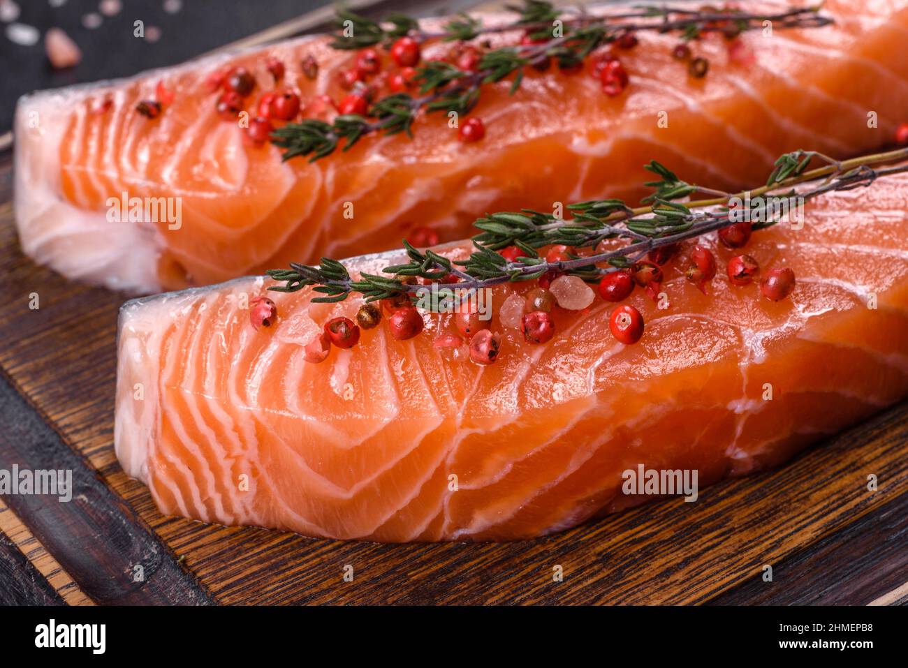 Salmon. Fresh raw salmon fish fillet with cooking ingredients and herbs ...