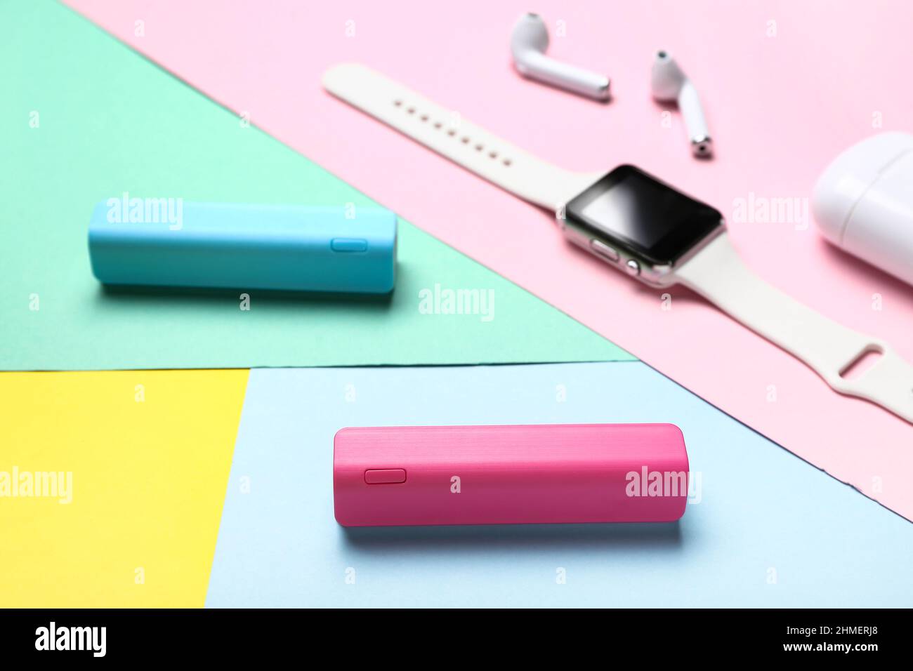 Modern power banks on color background, closeup Stock Photo - Alamy
