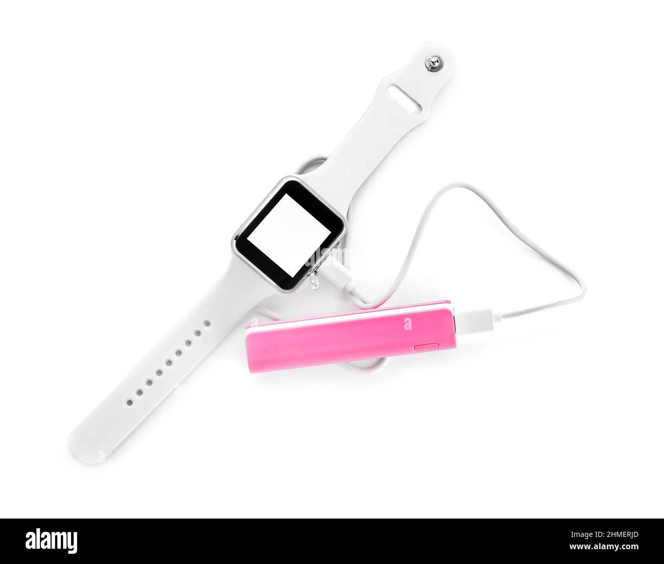 Pink power bank with smartwatch on white background Stock Photo - Alamy