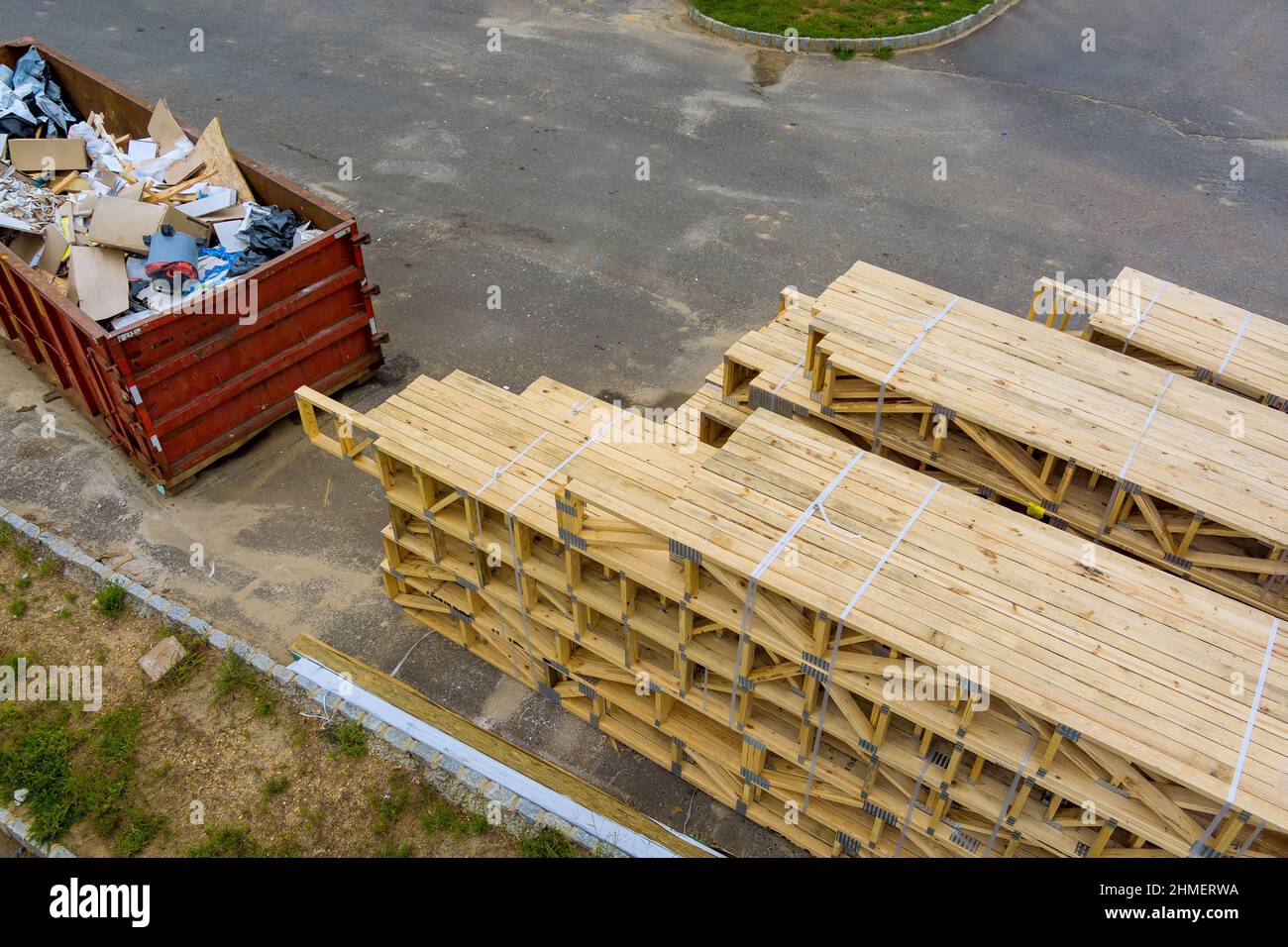 Packs of lumber at the natural materials from wood with roof rafters ...