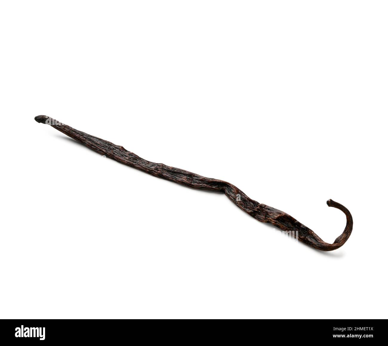 Dried vanilla pod isolated on white Stock Photo - Alamy