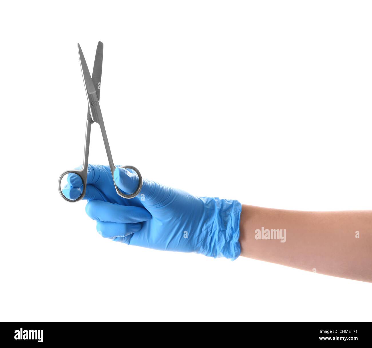 Female doctor with medical scissors on white background Stock Photo - Alamy