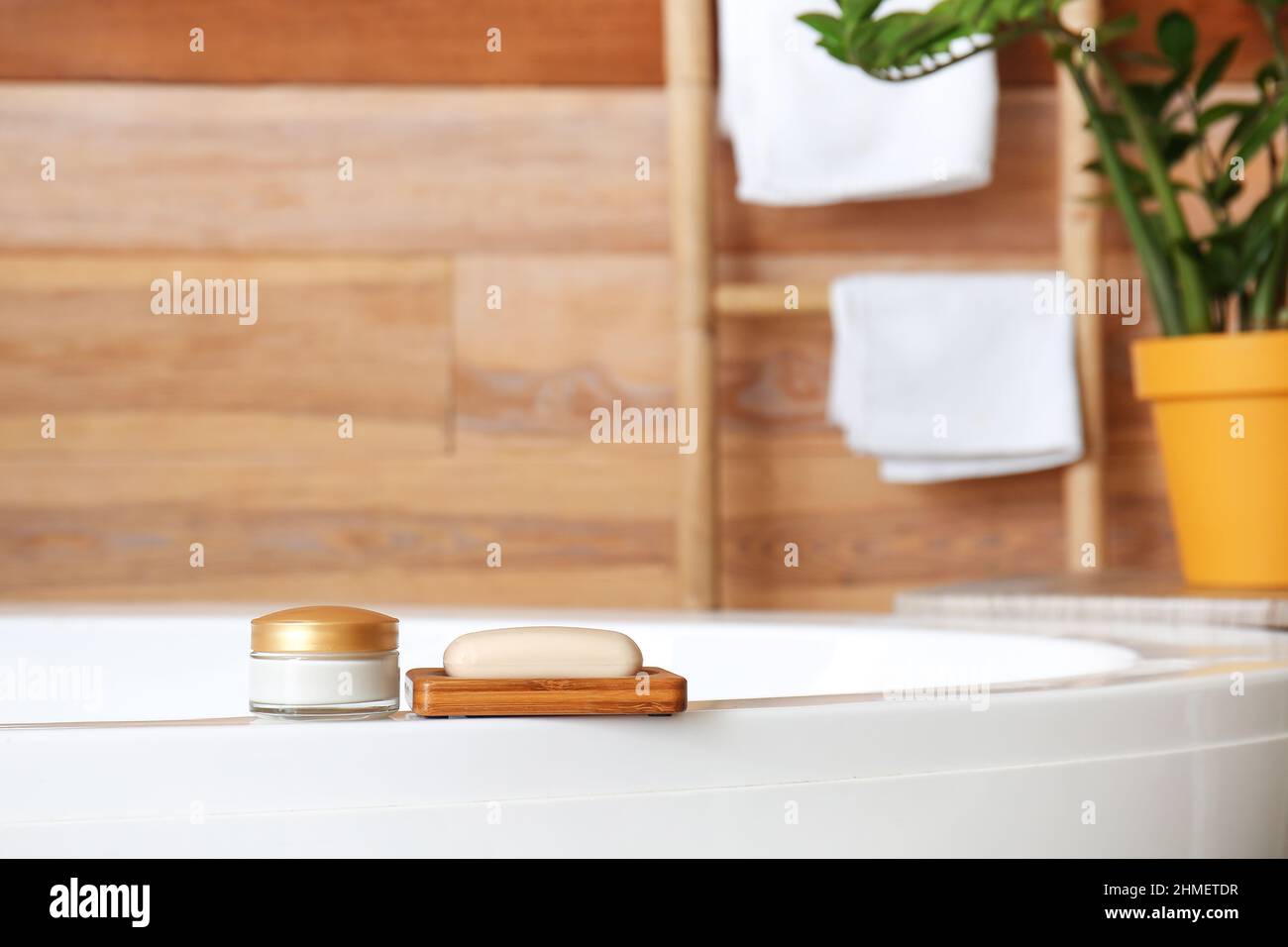 Jar with cream and soap in bathroom Stock Photo - Alamy