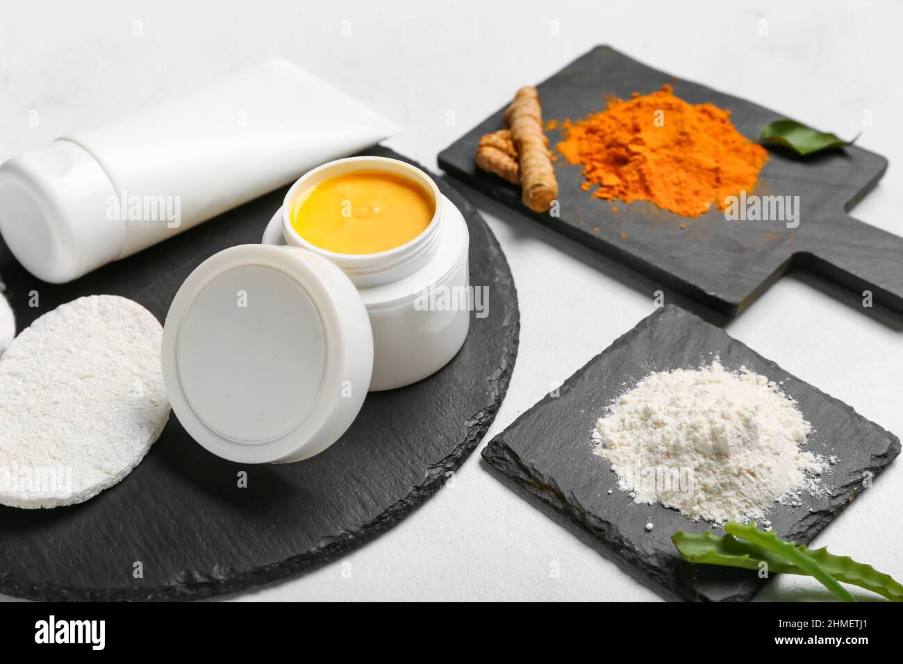 Composition with ingredients for turmeric mask and jars with care ...
