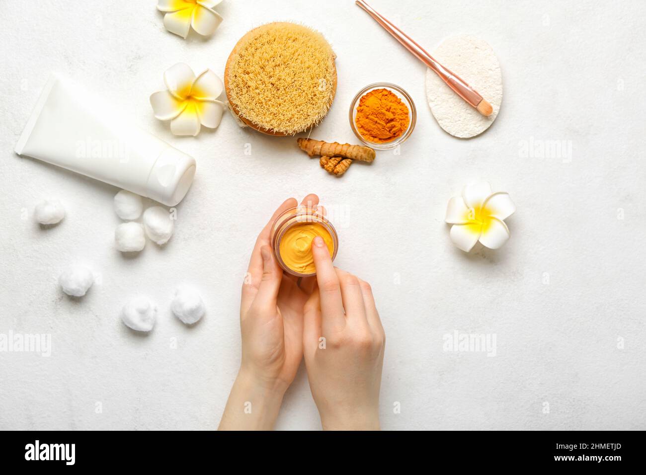 Female hands jar turmeric hi-res stock photography and images - Alamy