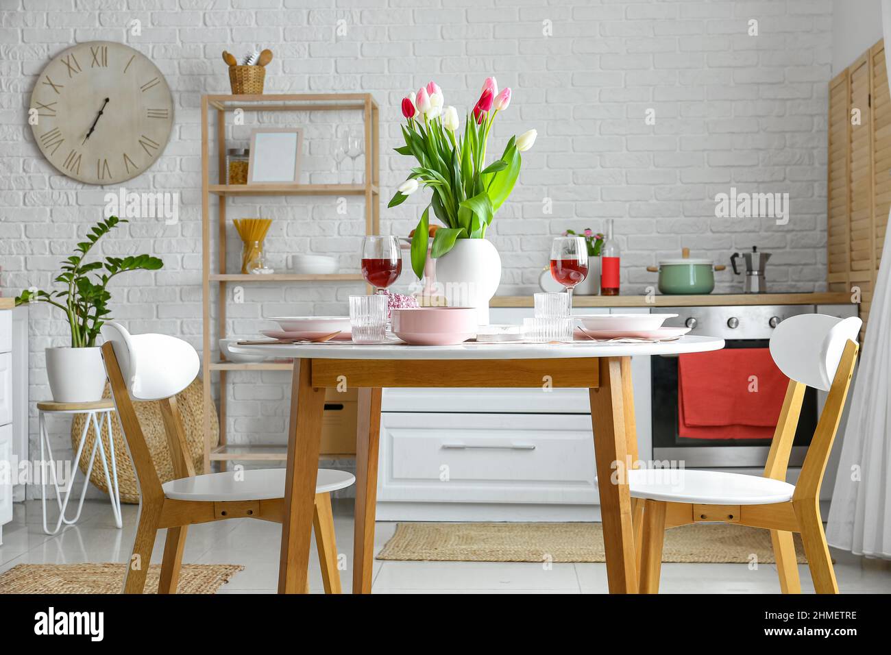 Dining table with stylish setting for International Women's Day ...