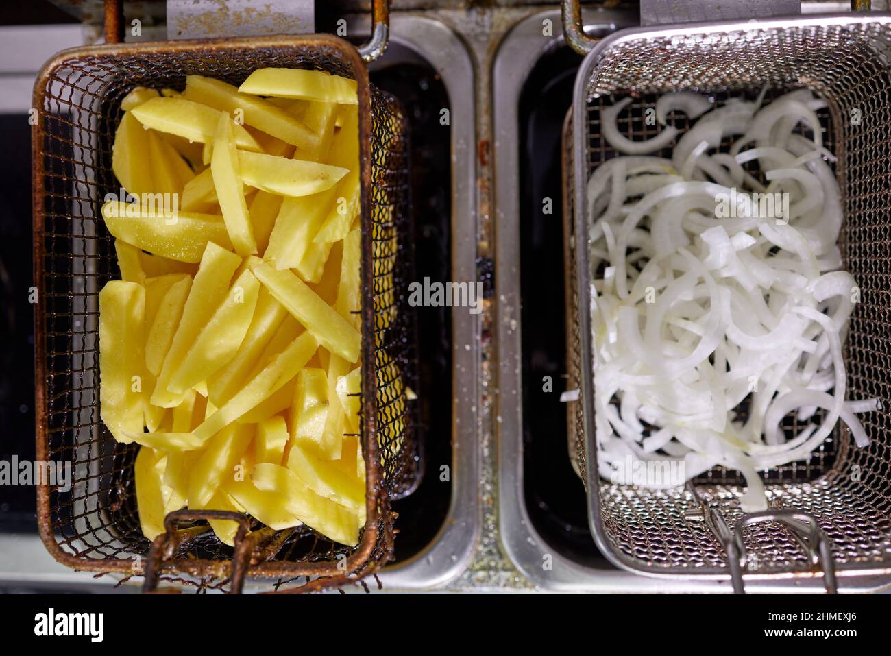 Dirty cooking area with french fries deep fryer Stock Photo - Alamy