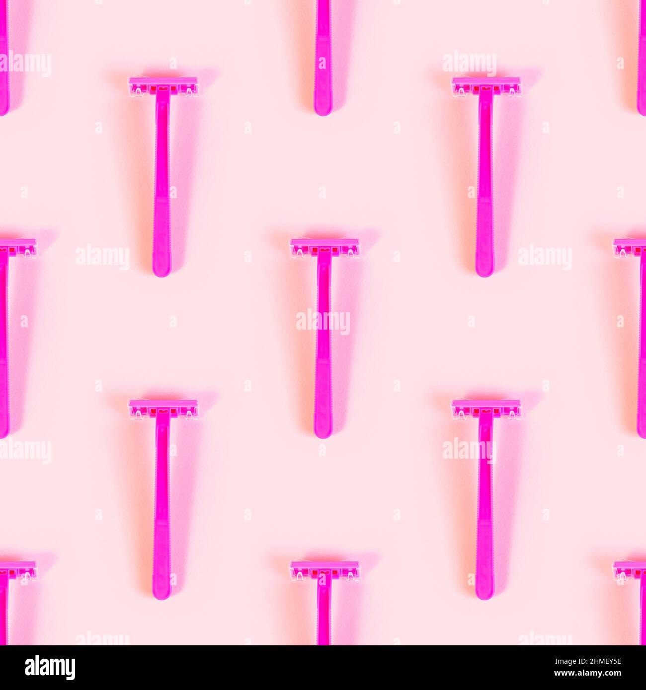 Pink disposable woman razor repeat seamless pattern on light pastel ...