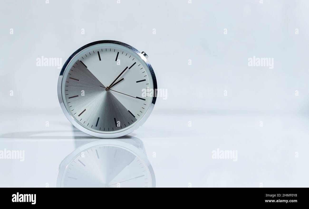 Male watch on white background with reflection Stock Photo - Alamy