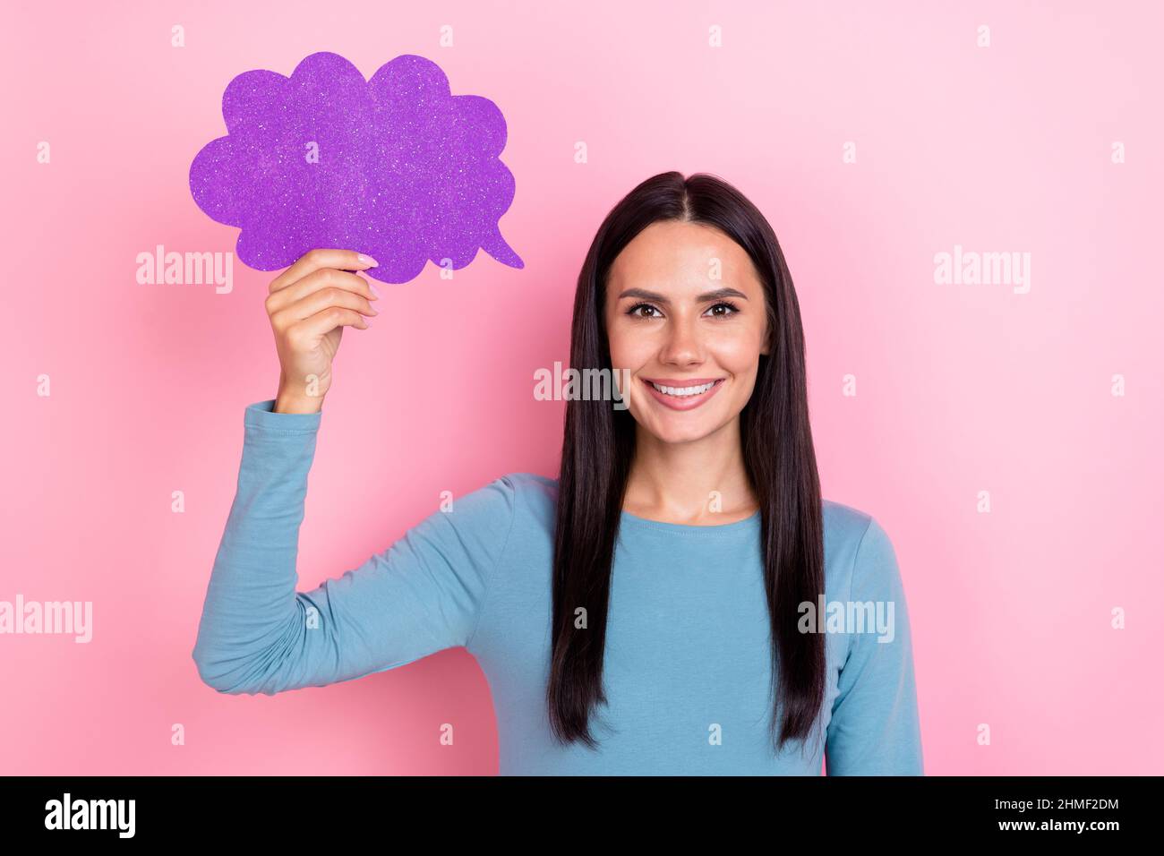 Photo of thoughtful charming young woman wear blue shirt holding mind ...