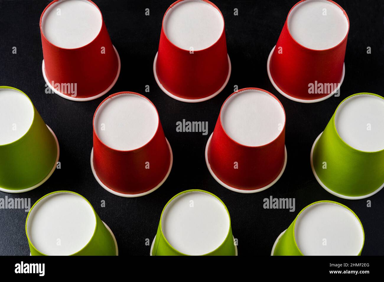 Creative minimalistic composition, pattern of inverted paper cups on a ...