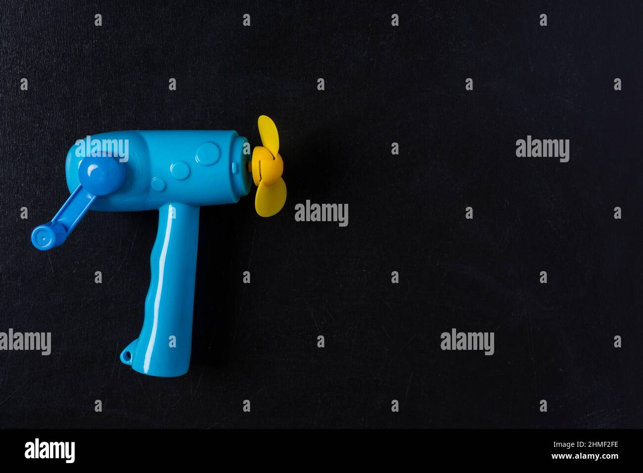 Wind fan toy hi-res stock photography and images - Alamy