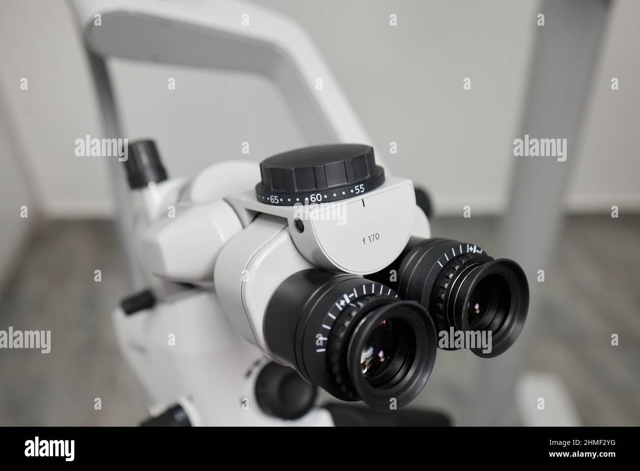 Dental microscope on the background of modern dentistry. Medical ...