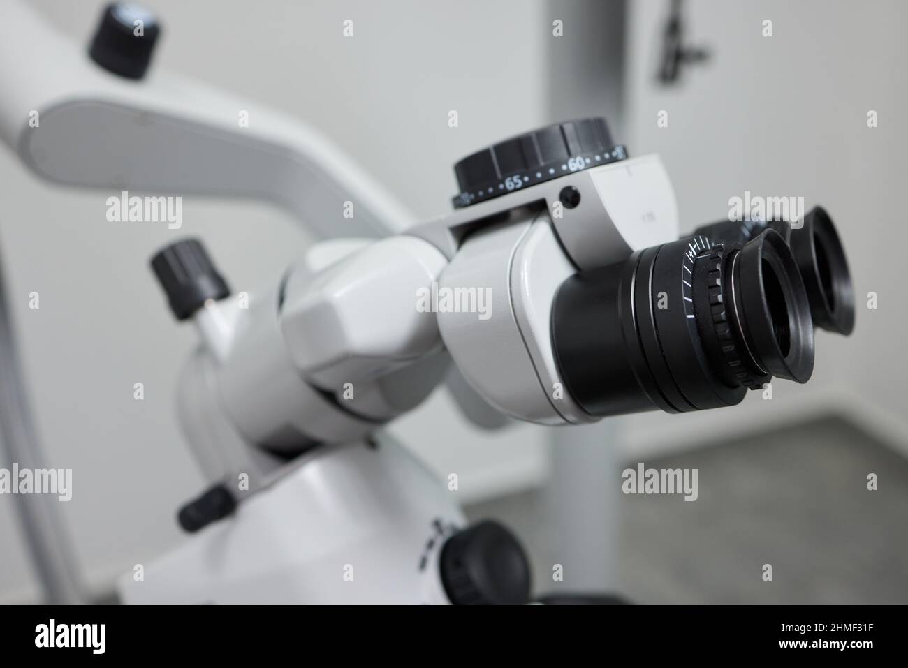 Dental microscope on the background of modern dentistry. Medical ...