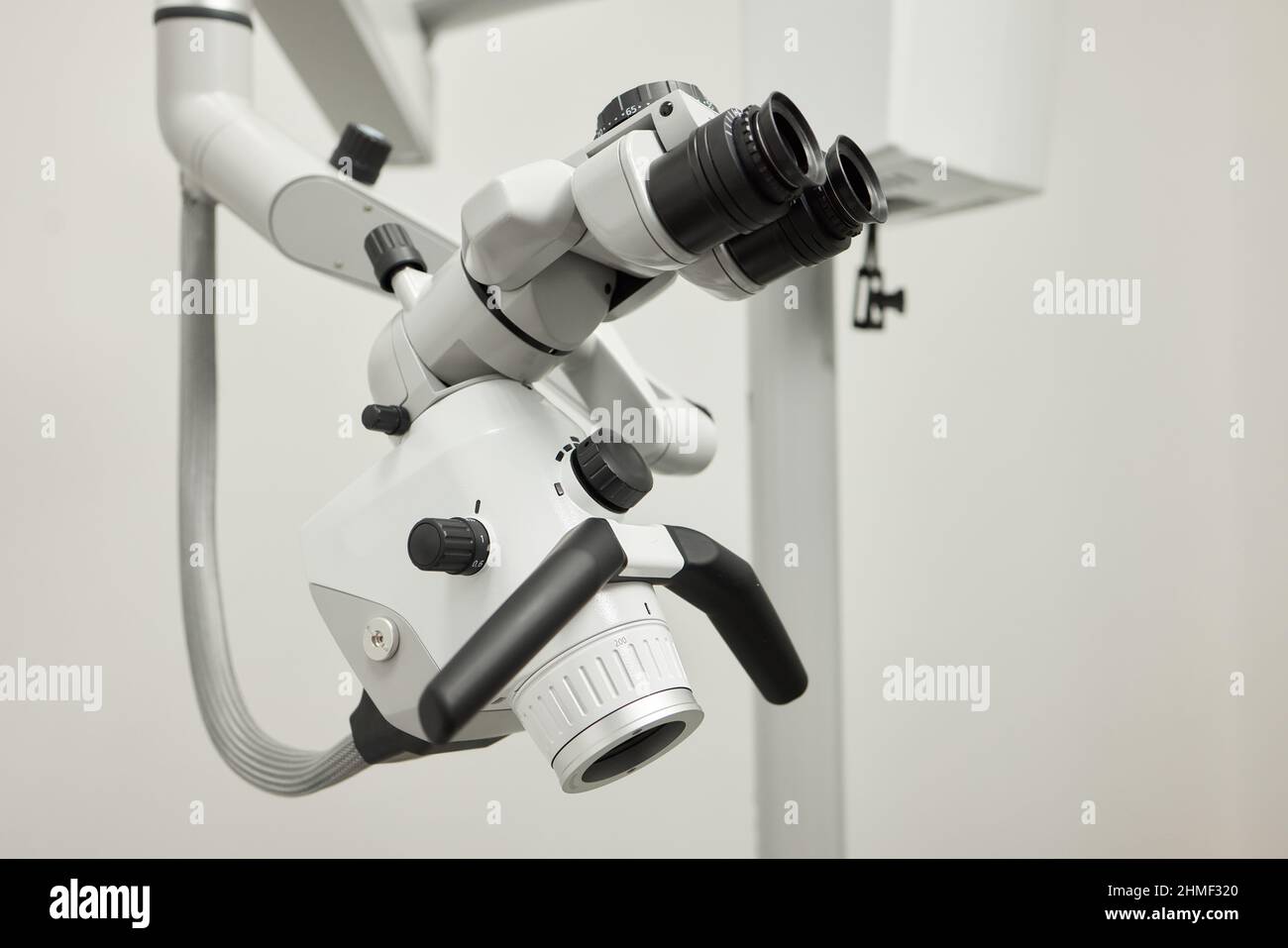 Dental microscope on the background of modern dentistry. Medical ...