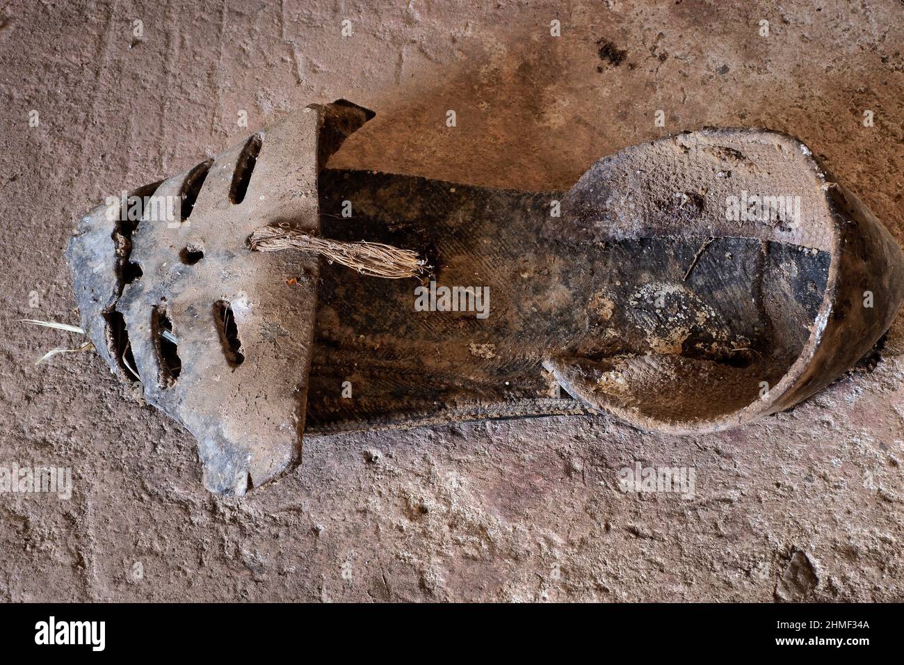 Spanish farm workers' shoe made of car tyres, rotten shoe on the ground ...