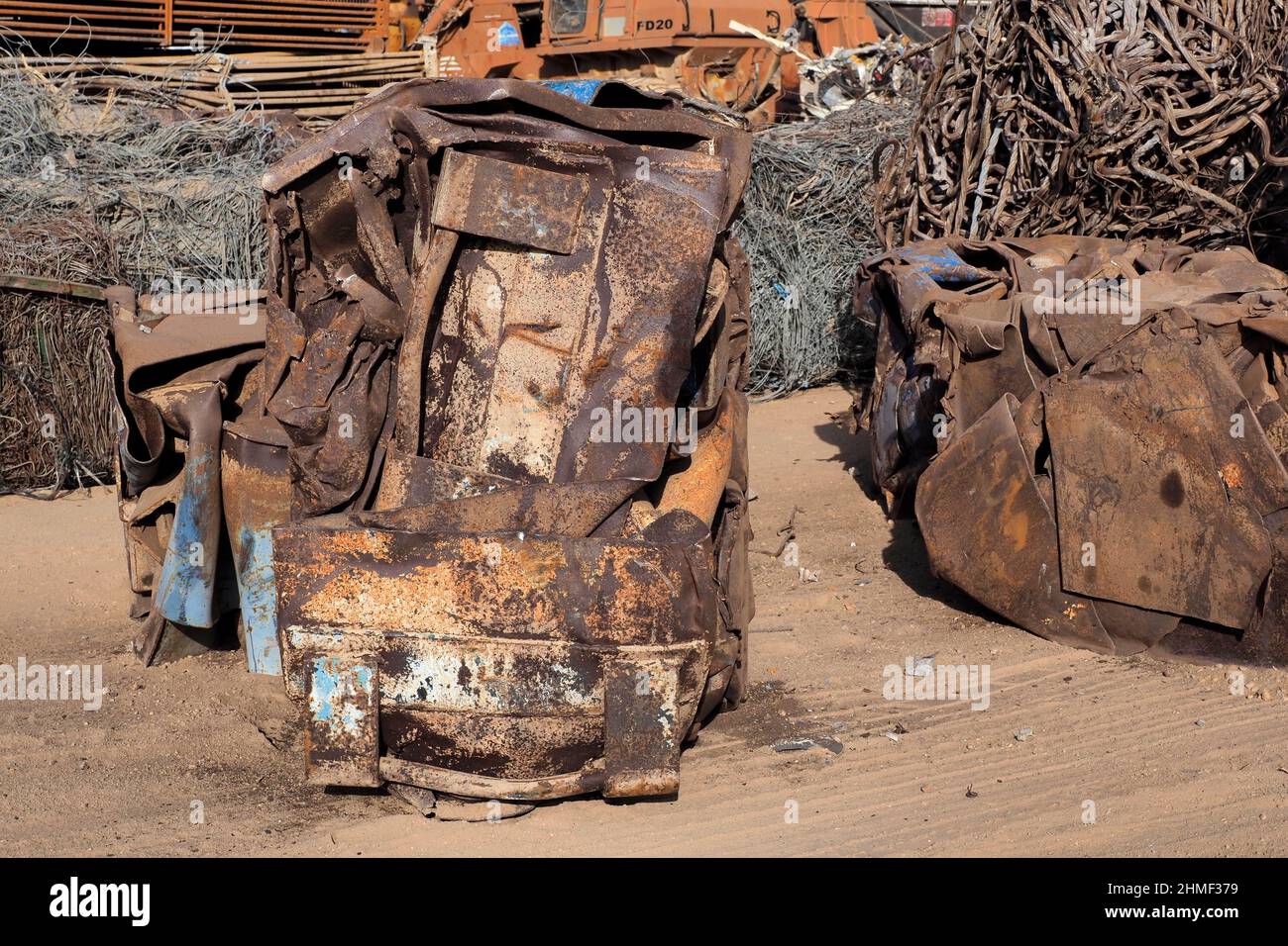 Cube of car sheet metal, Crushed car in cube, Scrap heap with metal ...