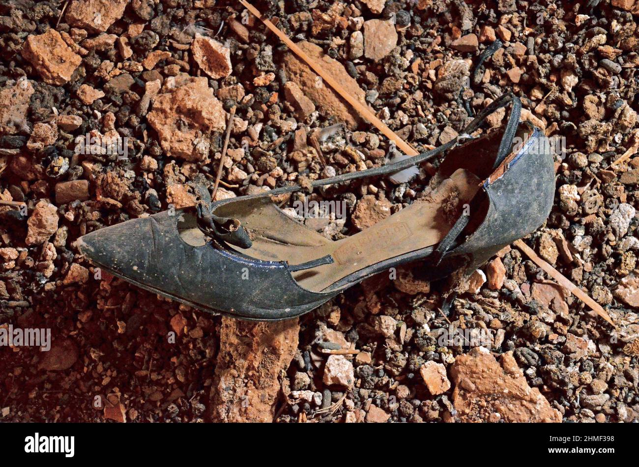 Black women's shoe with heel and bow at the bottom, rotten leather shoe ...