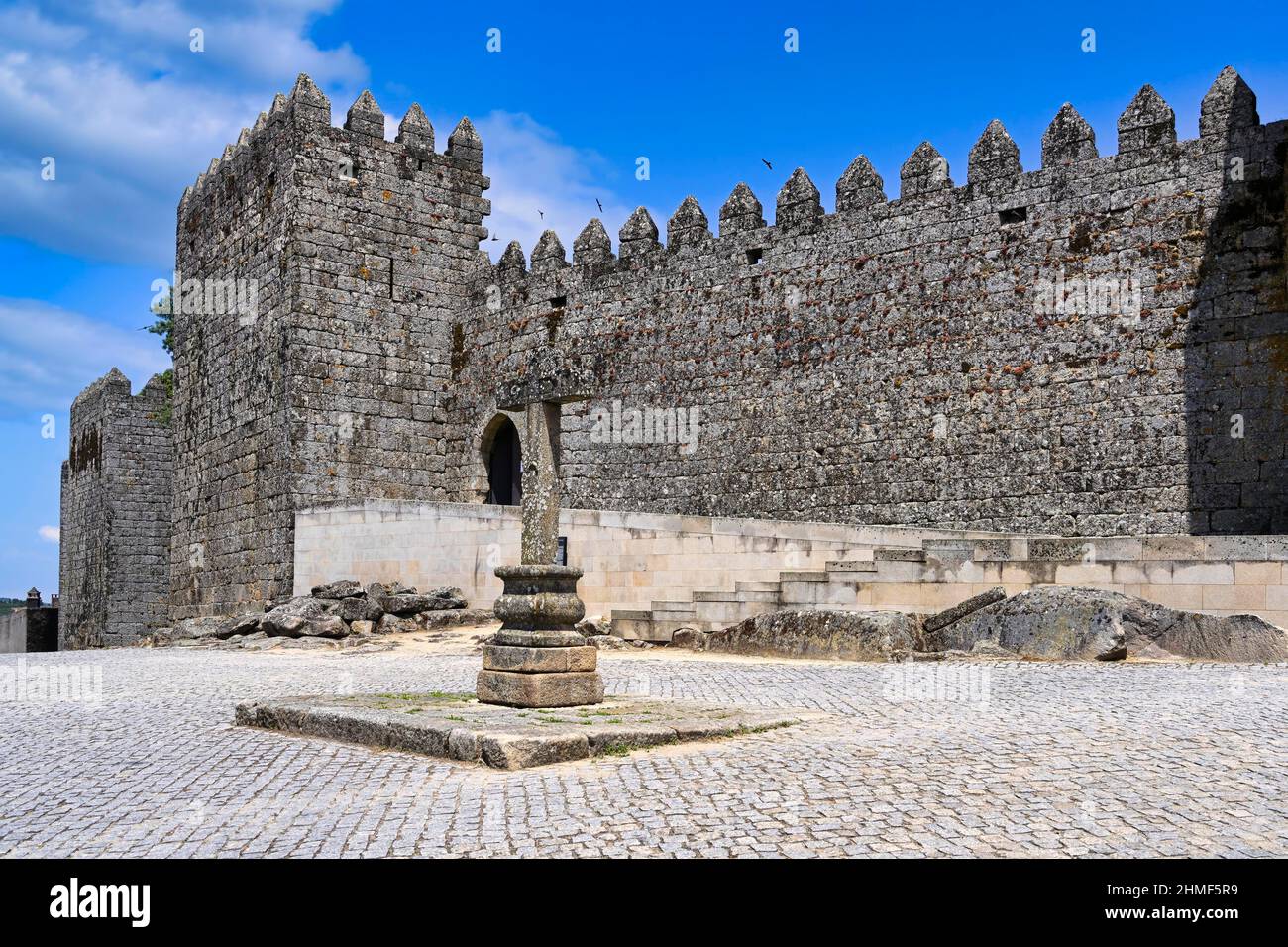 Cross next to castle walls, Trancoso, Serra da Estrela, Portugal Stock ...