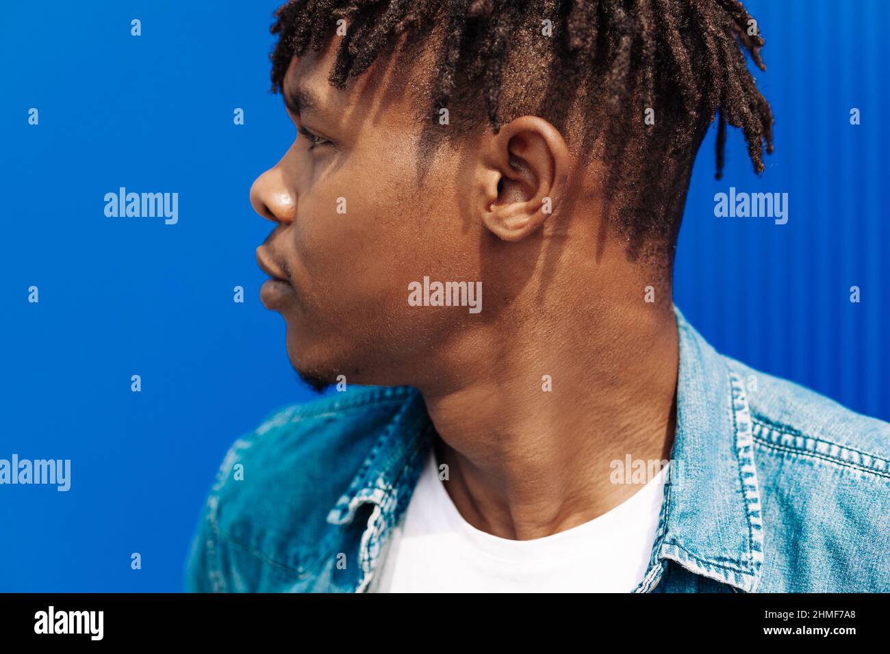 Young happy curly smiling african american man in casual wear and ...