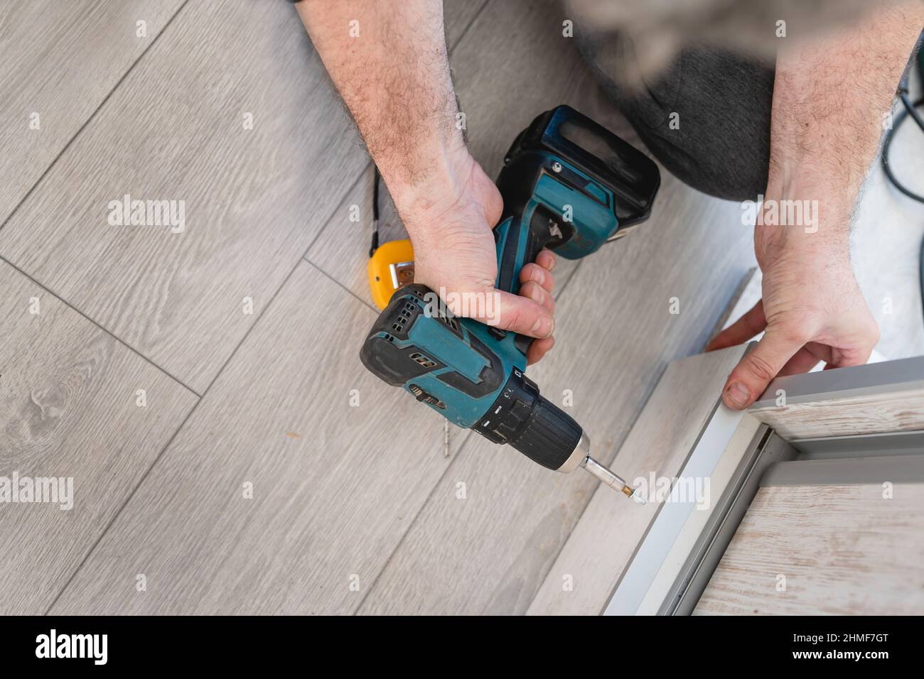 Man cordless drill hi-res stock photography and images - Alamy