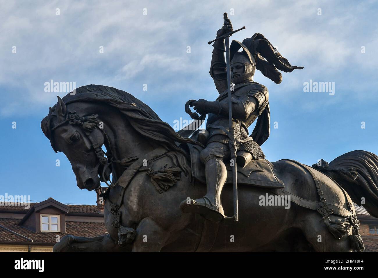 Detail of the equestrian statue of Emmanuel Philibert of Savoy against blue sky in Piazza San ...