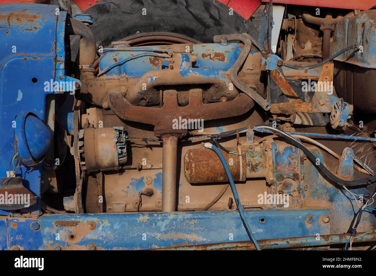 Rusty engine of tractor, Rusty bonnet of tractor, Tractor on scrap yard ...