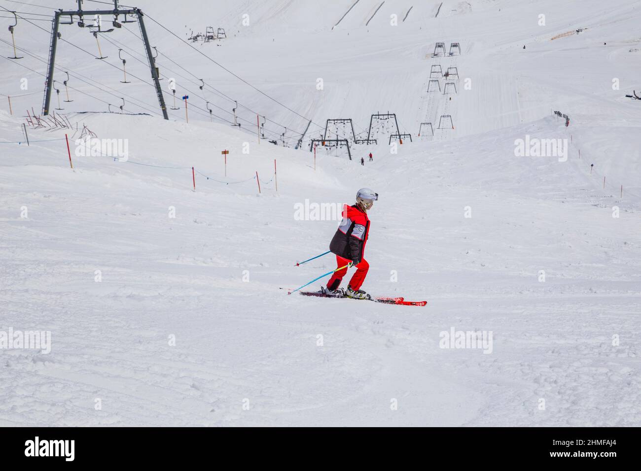 Skier on glacier ski slope Olperer, Hintertux glacier ski area in ... Skier on glacier ski slope Olperer, Hintertux glacier ski area in ...