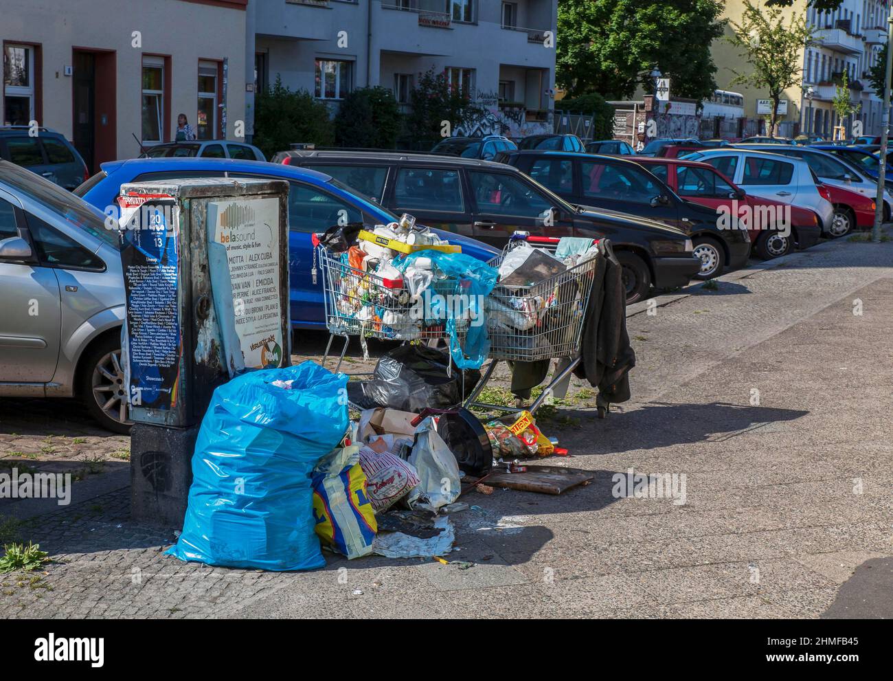 Litter on pavement due to plastic bags and household waste, Berlin ...