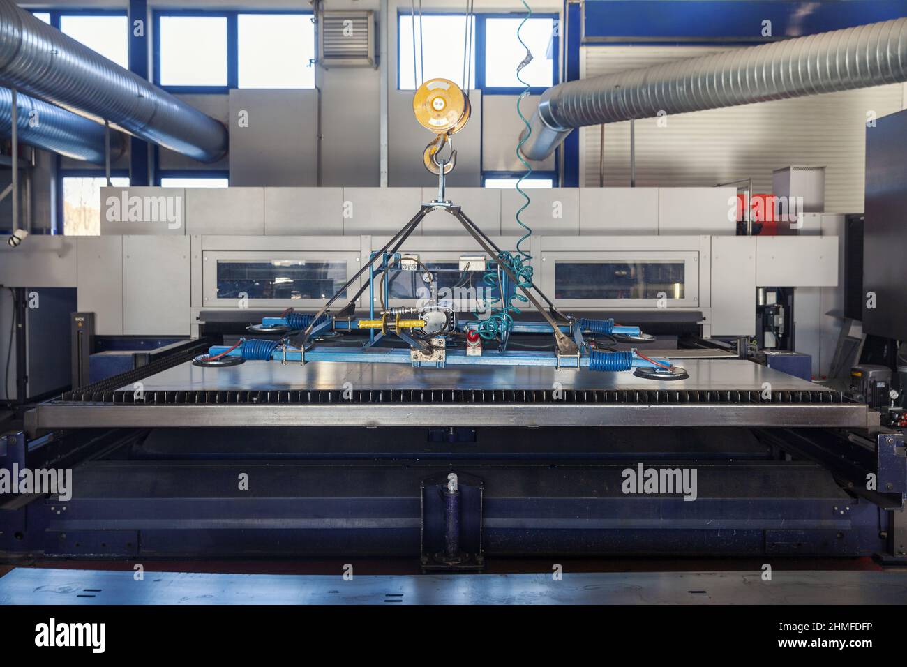 metal plate on the laser cutting support Stock Photo - Alamy