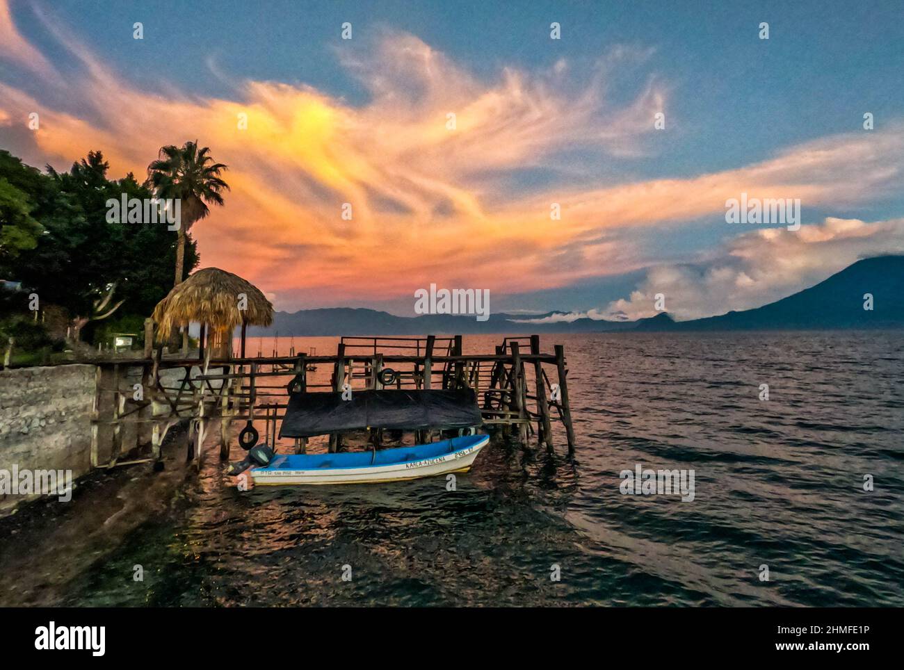 Sunset on the pier, Lake Atitlan, San Marcos, Guatemala Stock Photo - Alamy