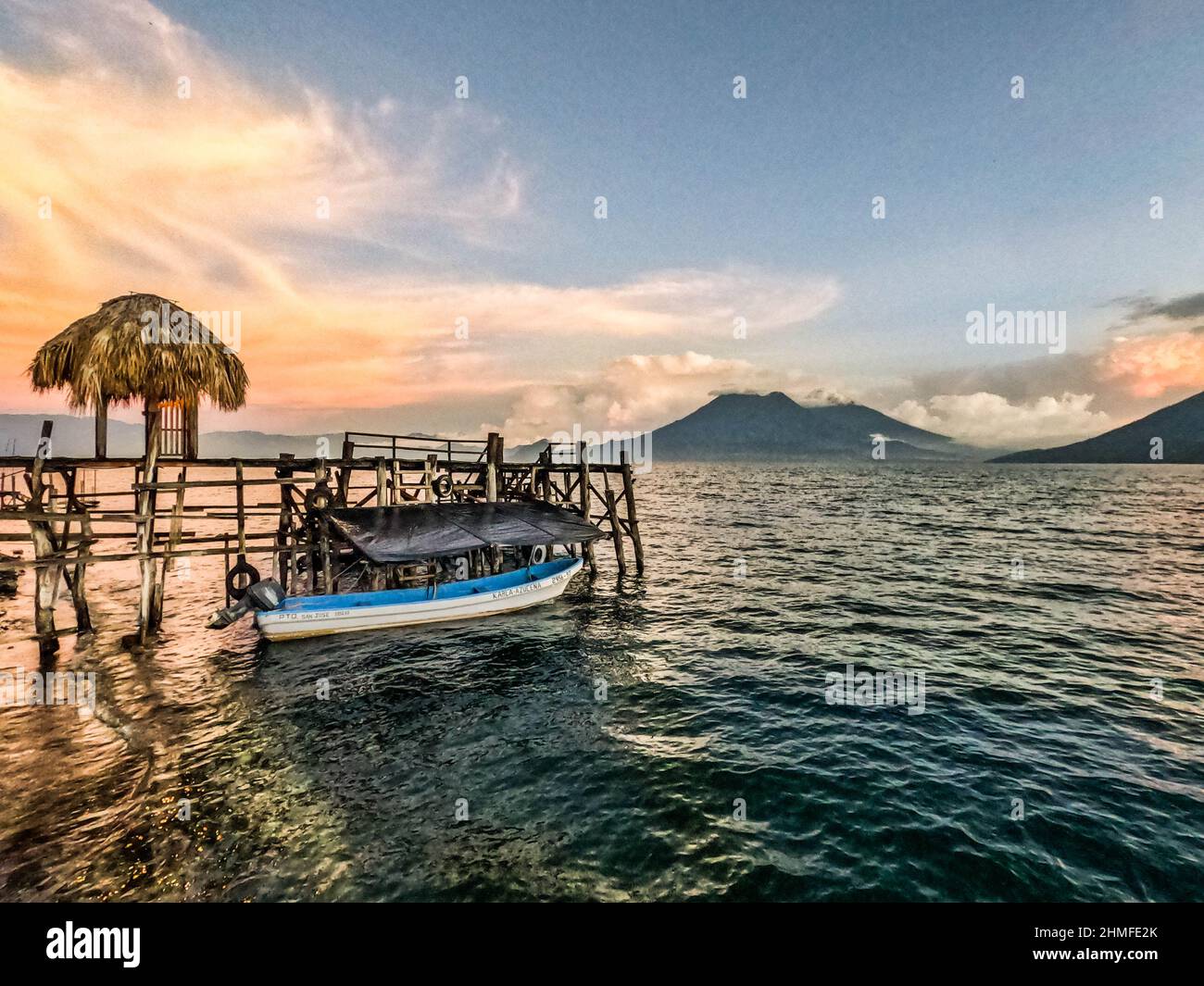 Sunset on the pier, Lake Atitlan, San Marcos, Guatemala Stock Photo - Alamy